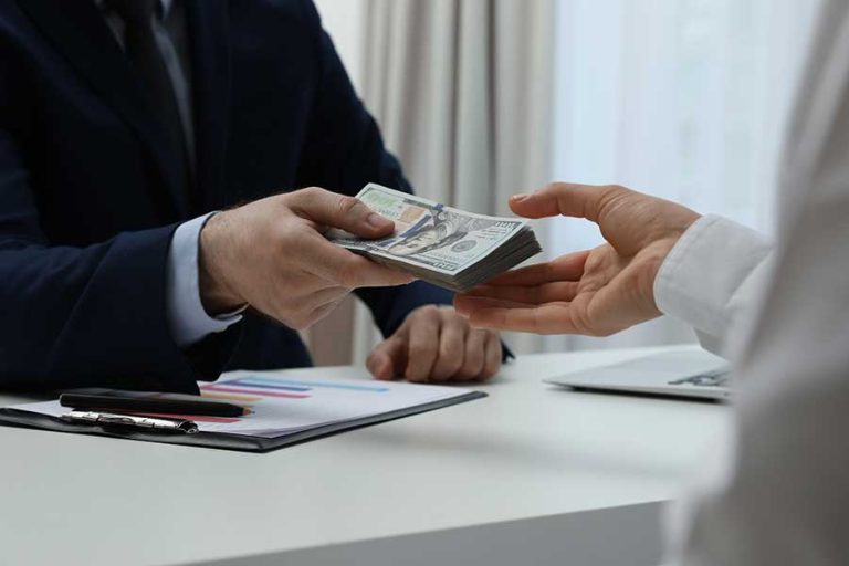 What Happens if I Deposit $10,000 or More Into My Bank Account?
